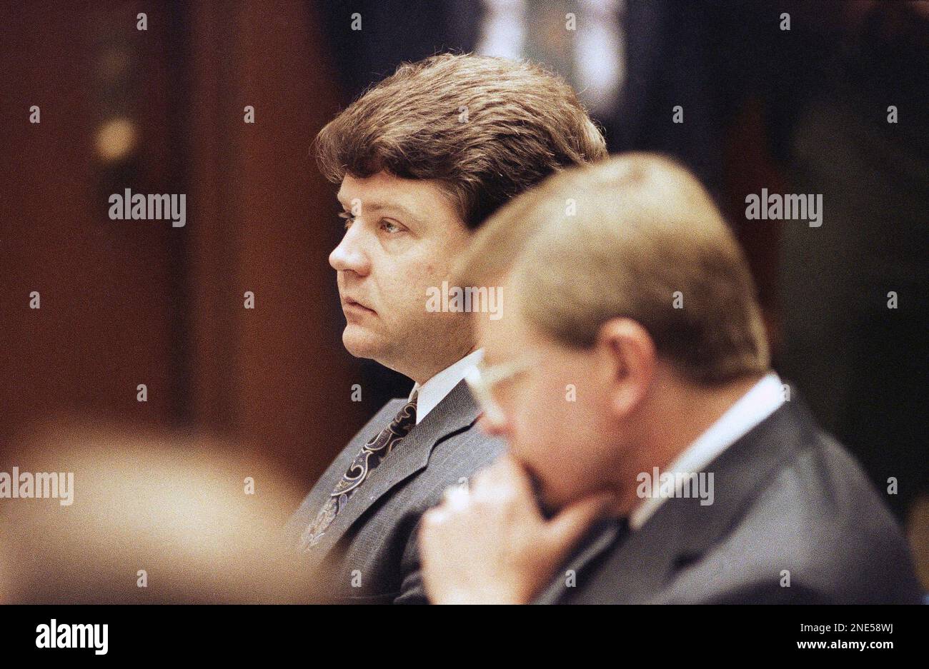 Los Angeles Police Officer Laurence Powell, left, and his attorney ...