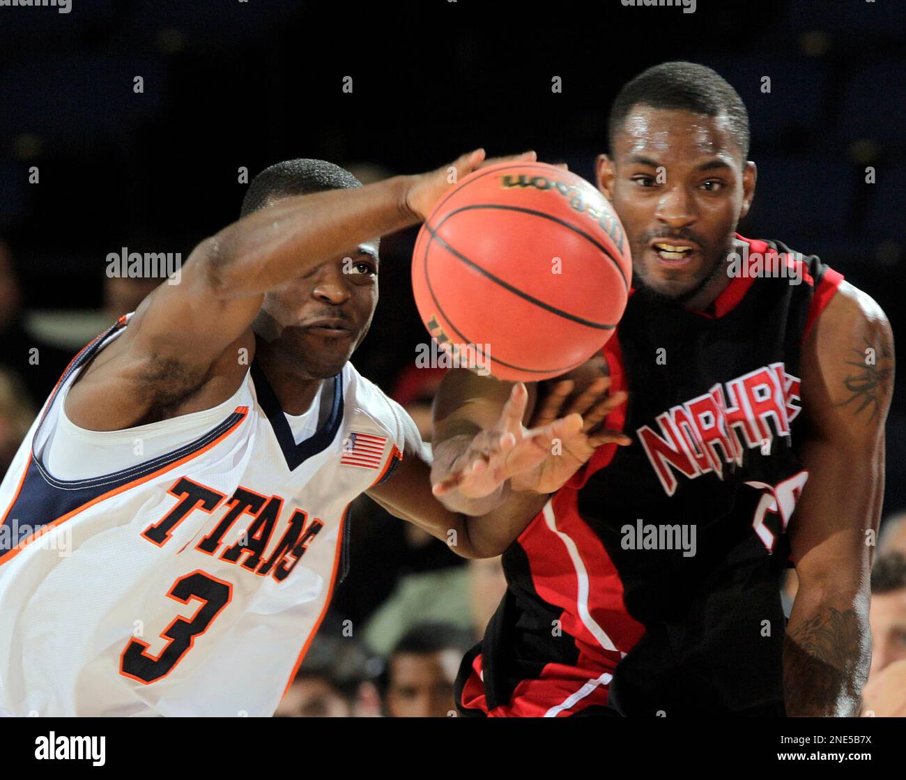 Cal State Fullerton's Devon Peltier, left, and Cal State Northridge's ...