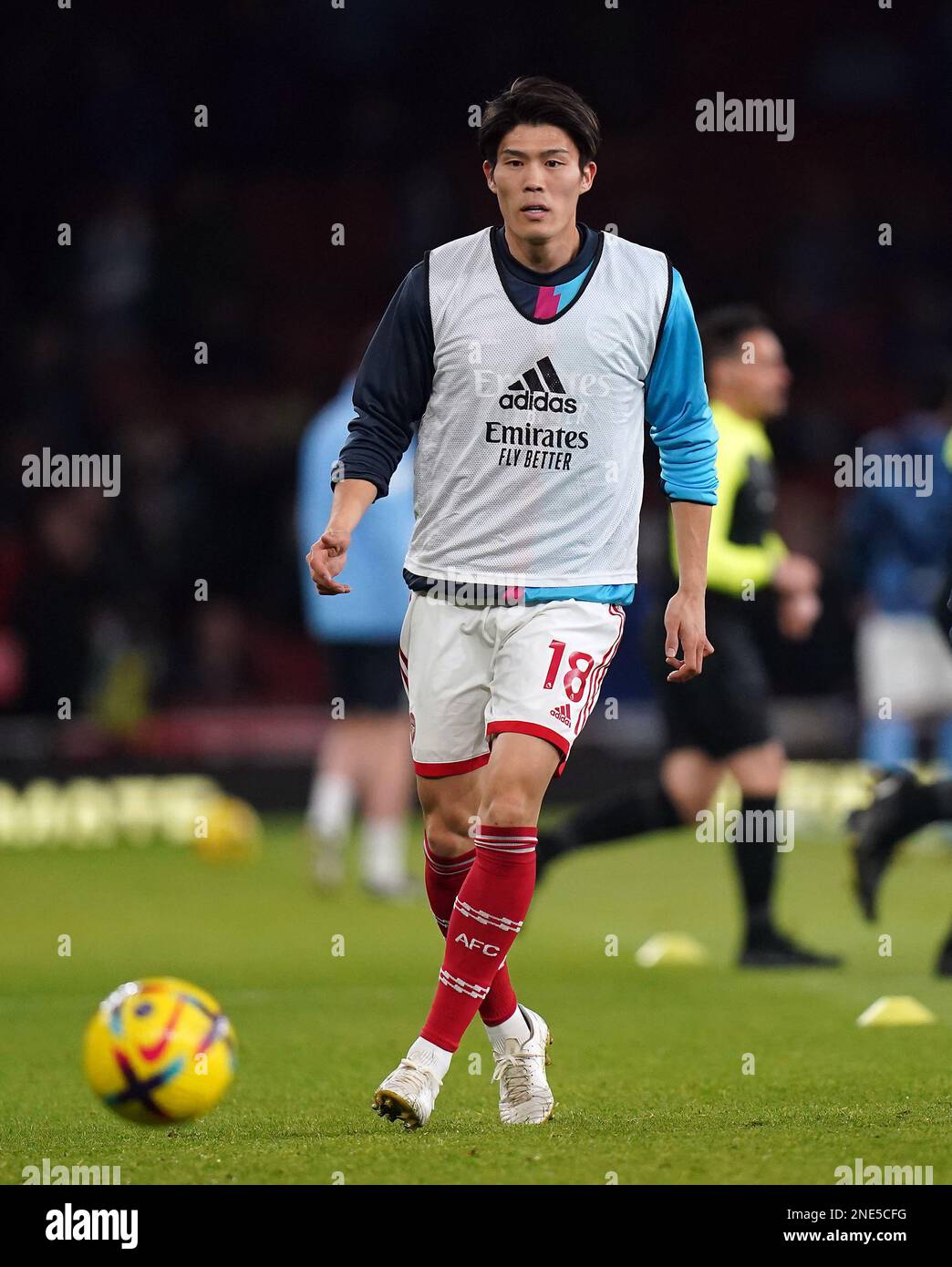 Arsenal’s Takehiro Tomiyasu warms up before the Premier League match at ...