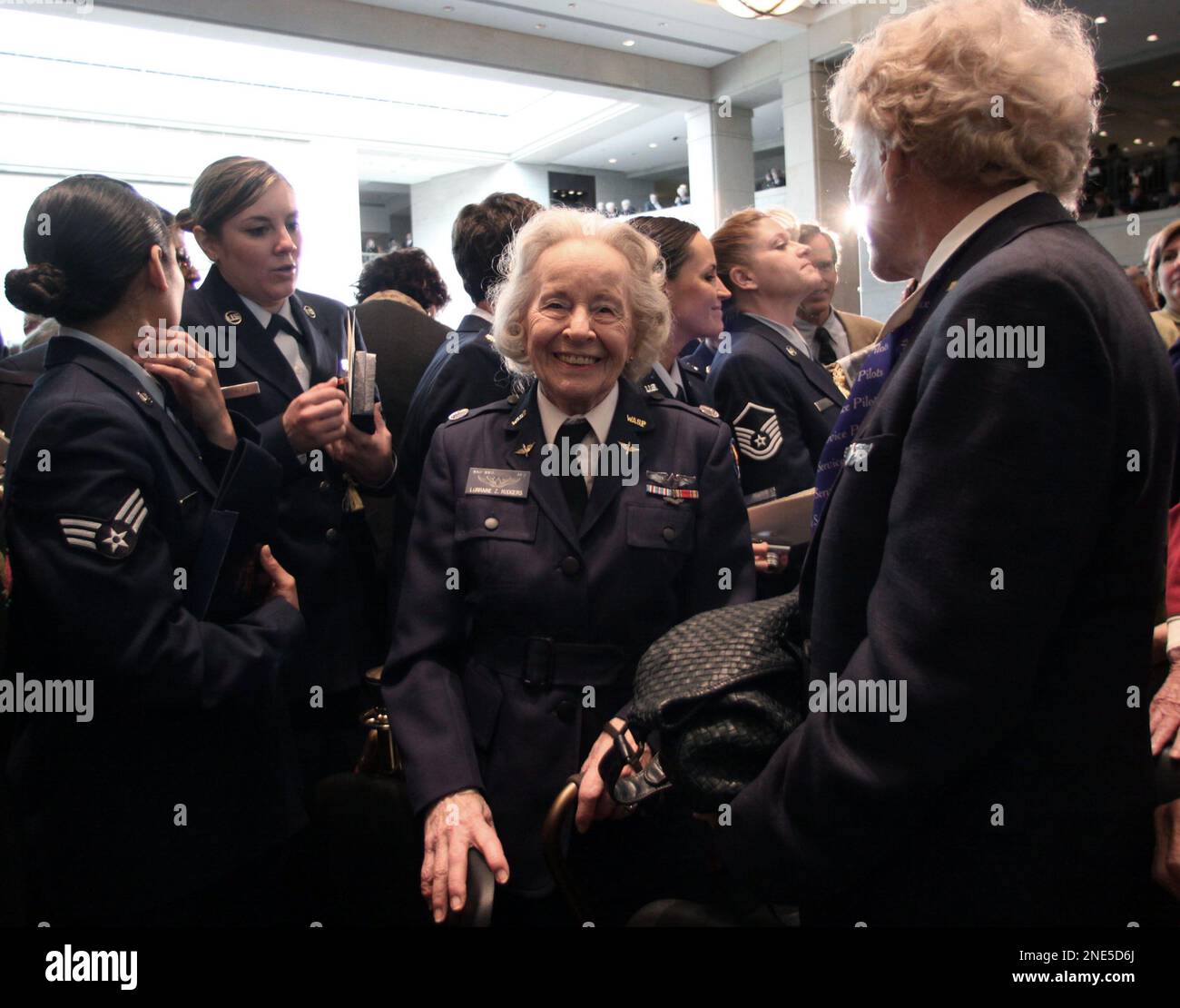 Former pilot Lorraine Rodgers of Alexandria, Va., center, is seen on ...