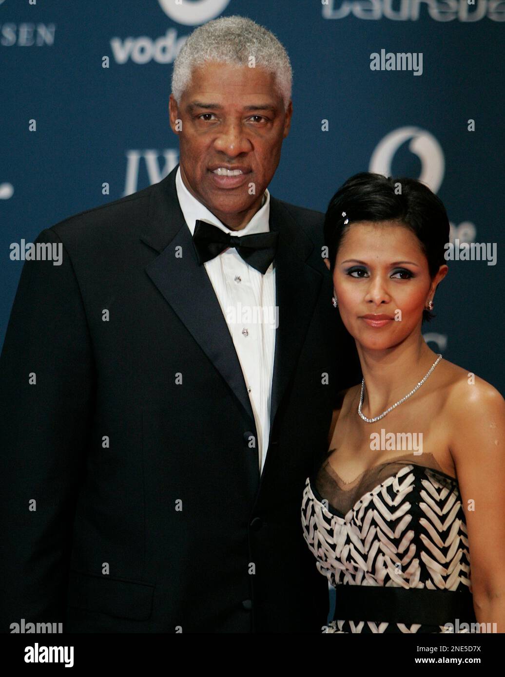 Retired American basketball player Julius Erving, left, arrives with ...