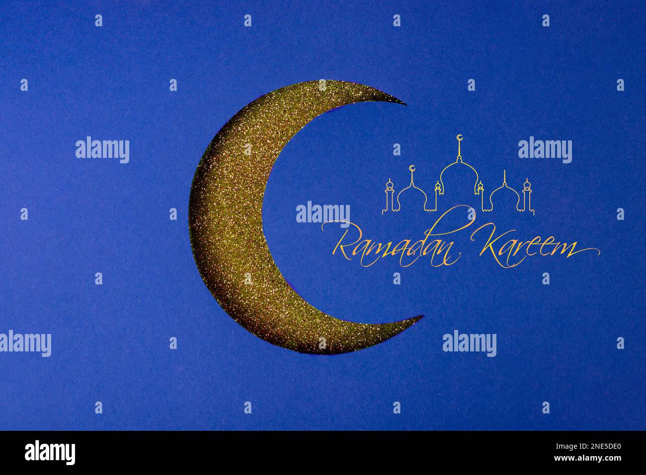 Crescent moon Cut out of paper on a glitter background with empty space ...