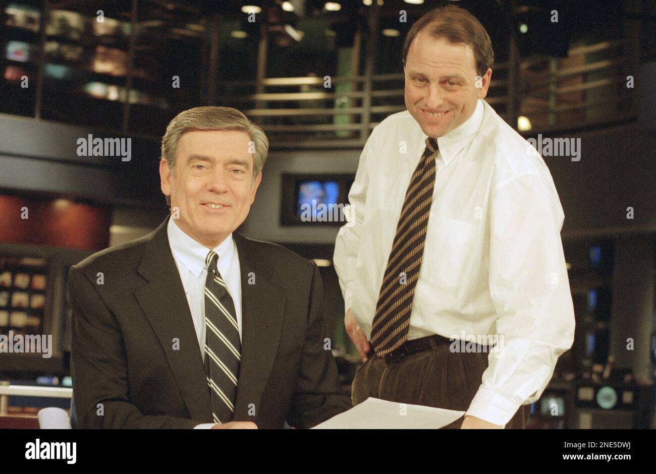 News anchor Dan Rather, seated, and producer Jeff Fager are shown March ...