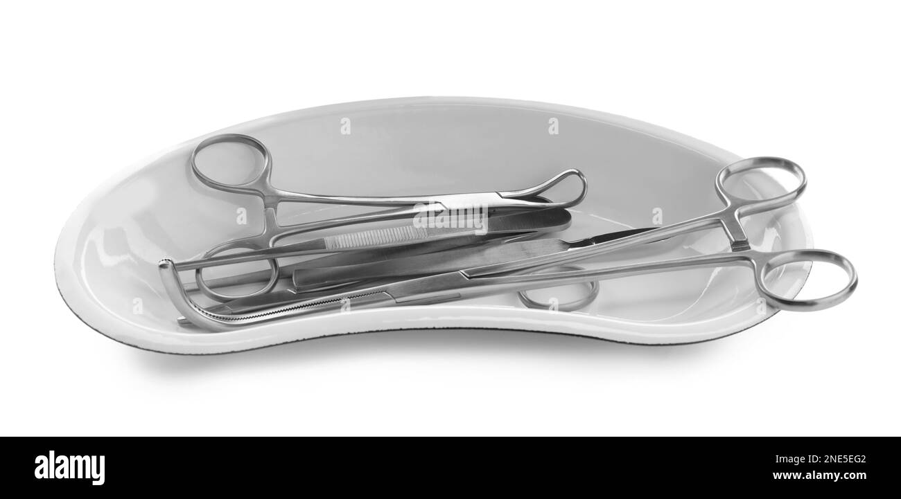 Surgical instruments in kidney dish on white background Stock Photo - Alamy