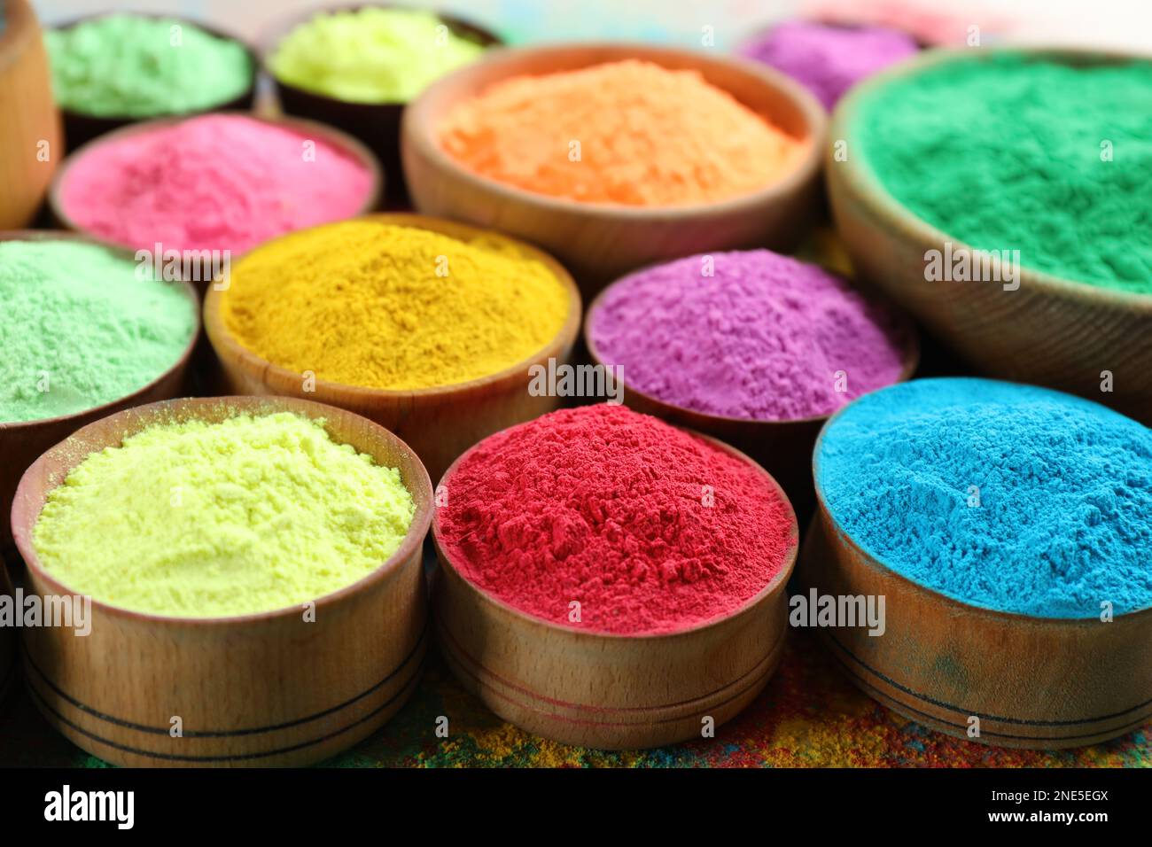 Colorful powder dyes as background, closeup. Holi festival Stock Photo ...