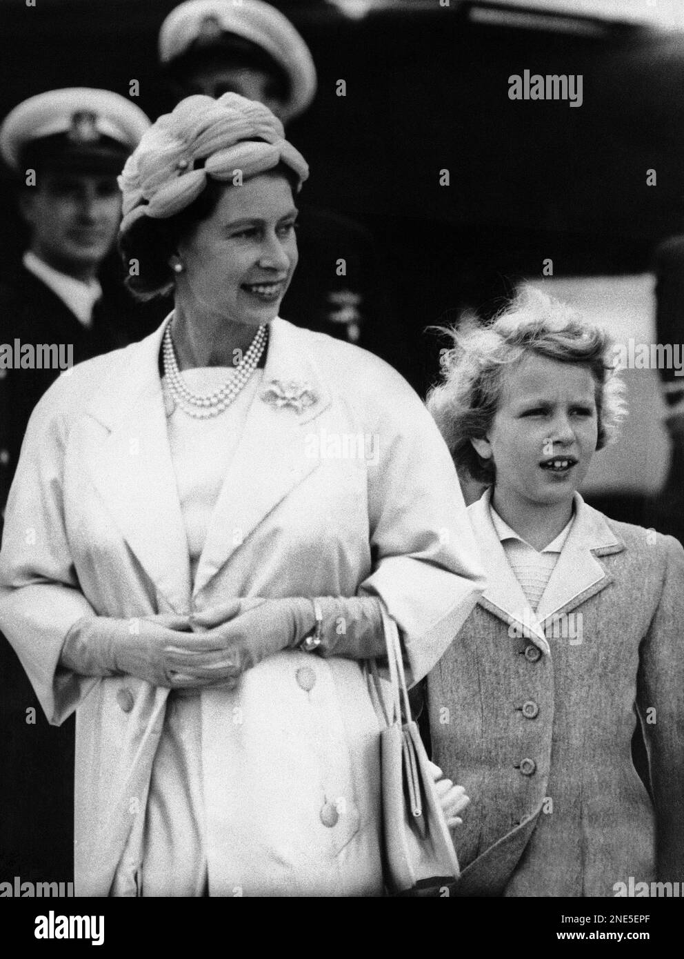 A smiling Queen Elizabeth II and Princess Anne are shown at London ...
