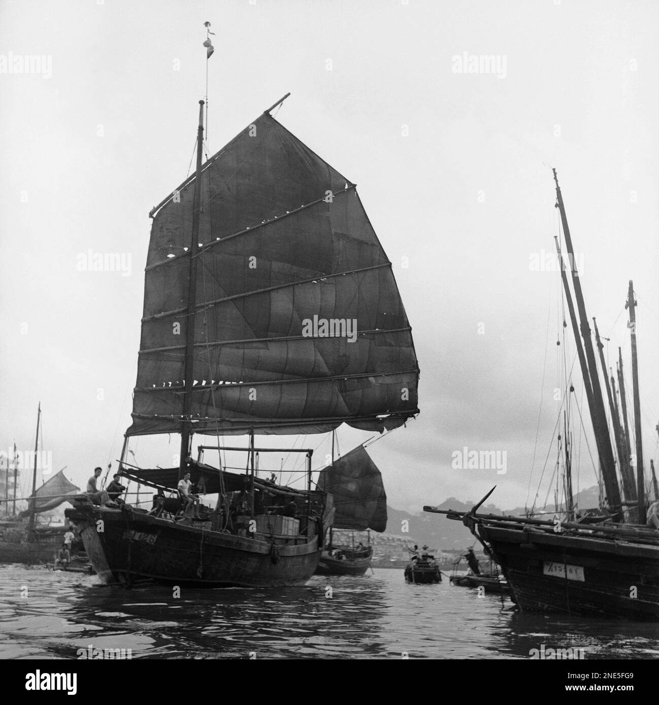 Large junk moves through one of the main waterways in the Yaumati ...