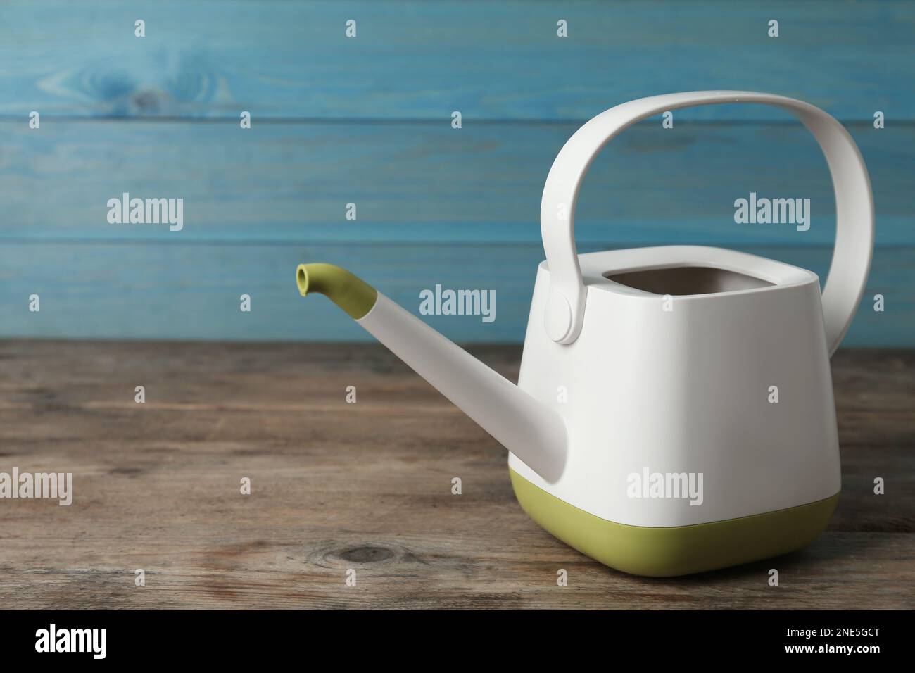 Modern watering can hi-res stock photography and images - Alamy