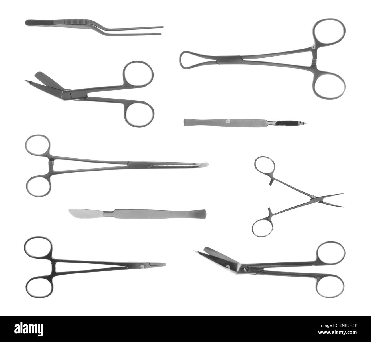 Set with different surgical instruments on white background Stock Photo ...