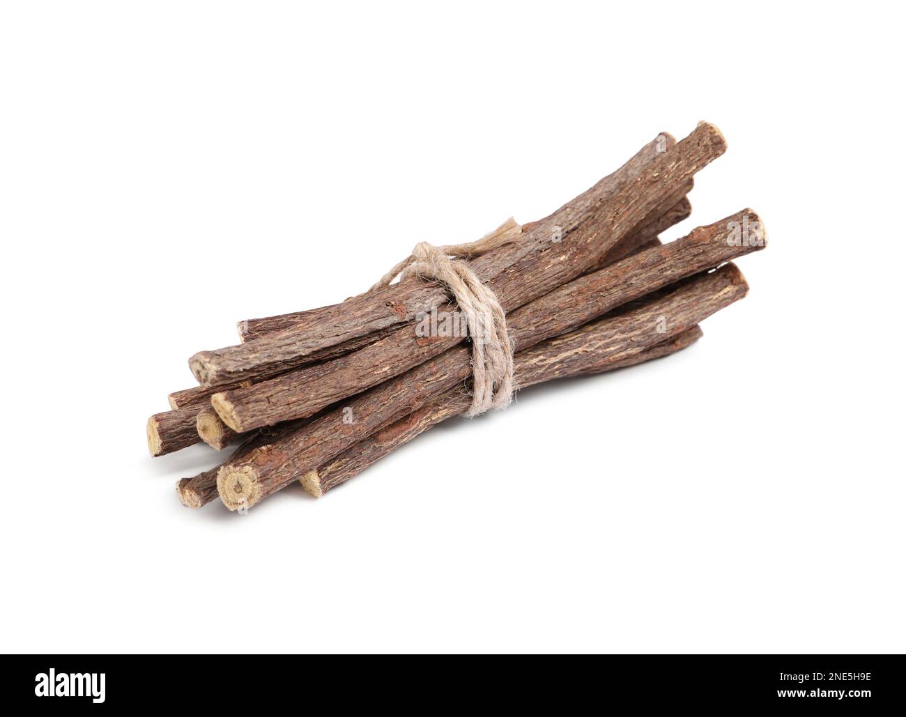 Dried sticks of liquorice root on white background Stock Photo - Alamy