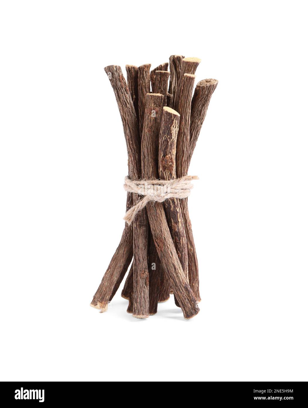 Dried sticks of liquorice root on white background Stock Photo - Alamy