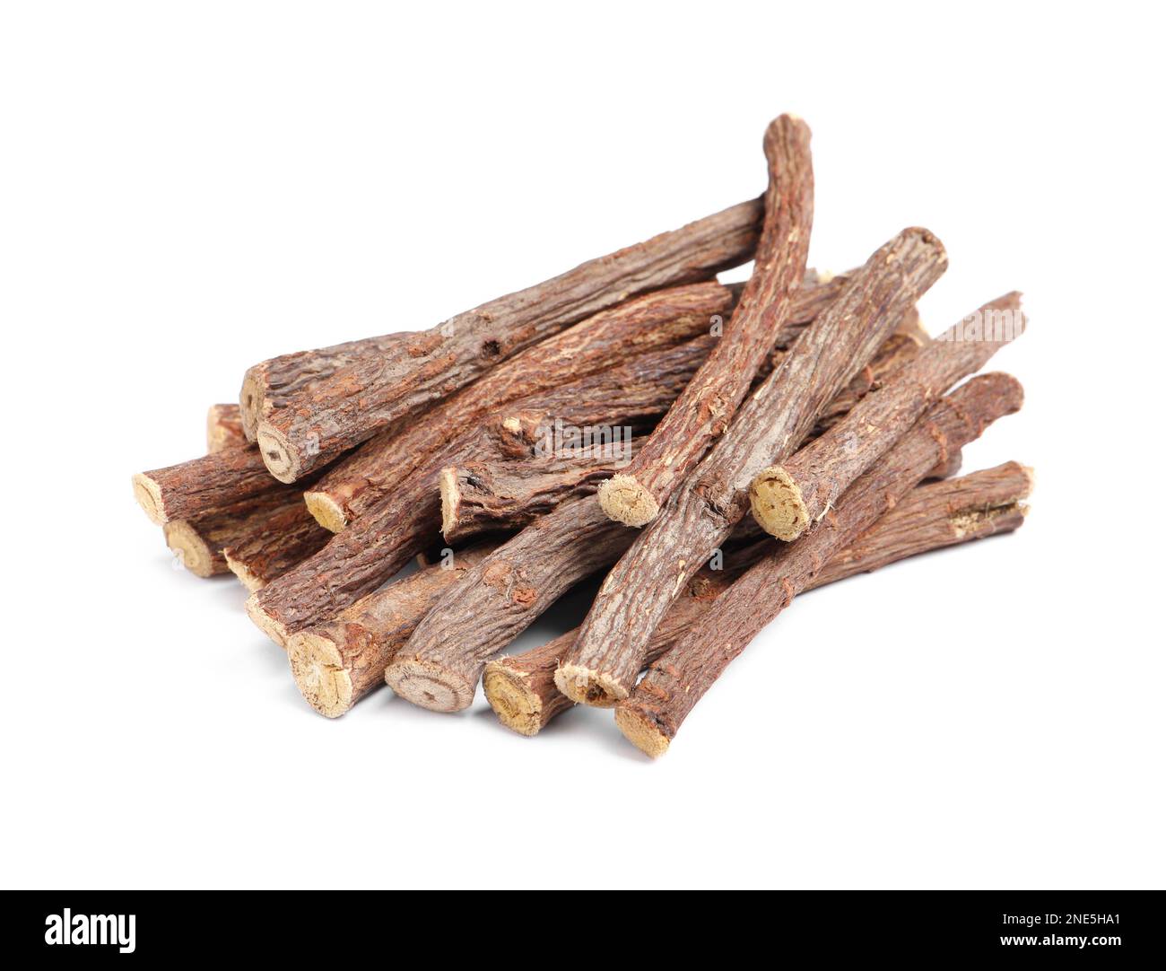 Dried sticks of liquorice root on white background Stock Photo - Alamy