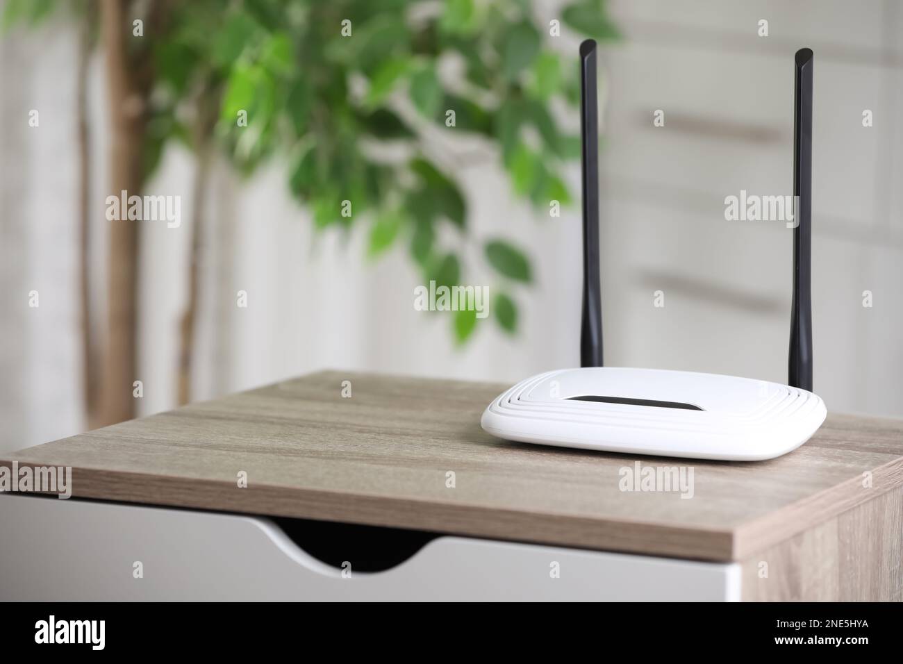 Modern Wi-Fi router indoors. Space for text Stock Photo - Alamy
