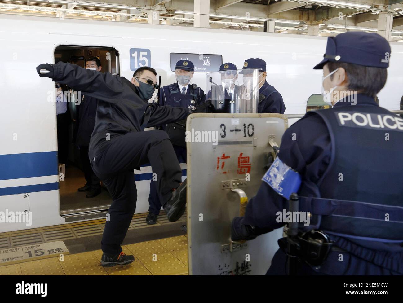 Police conduct an anti-terrorism drill on a shinkansen bullet train ...