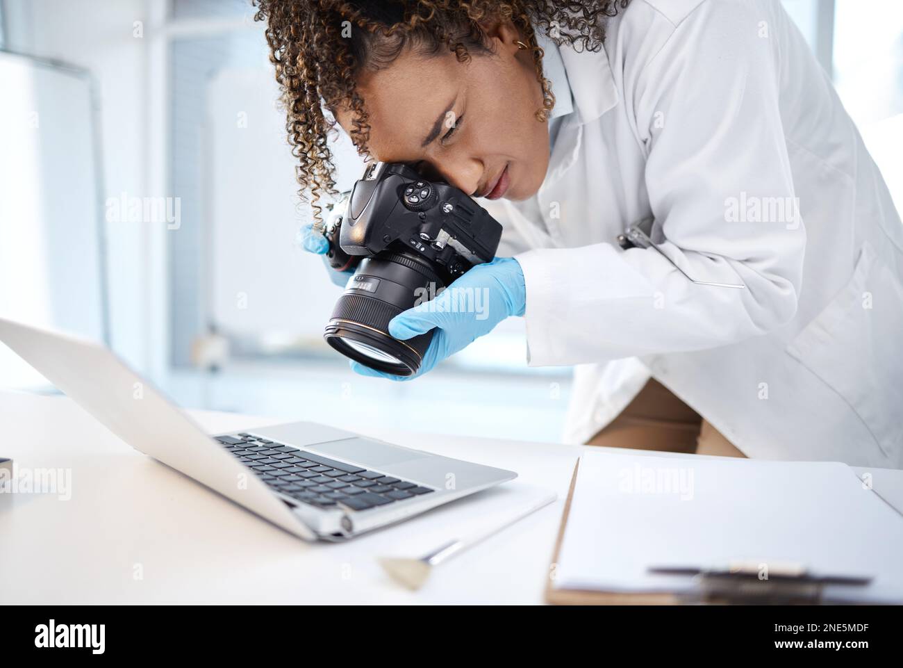 Black woman, forensic investigation and camera for laptop, it and cyber ...