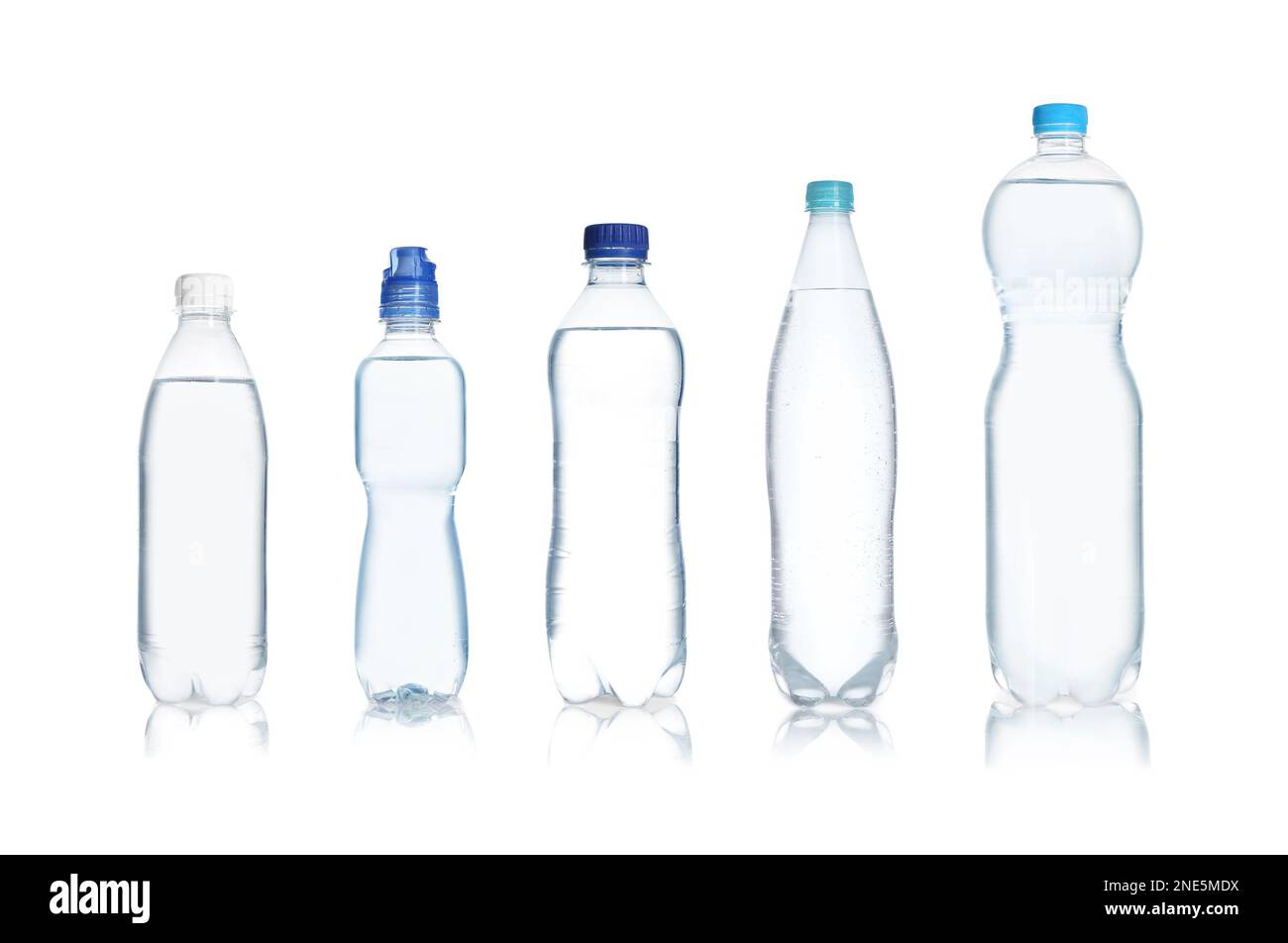 Set with different bottles of pure water on white background Stock ...