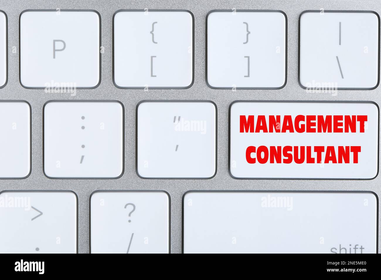 Button with text MANAGEMENT CONSULTANT on keyboard, top view Stock ...