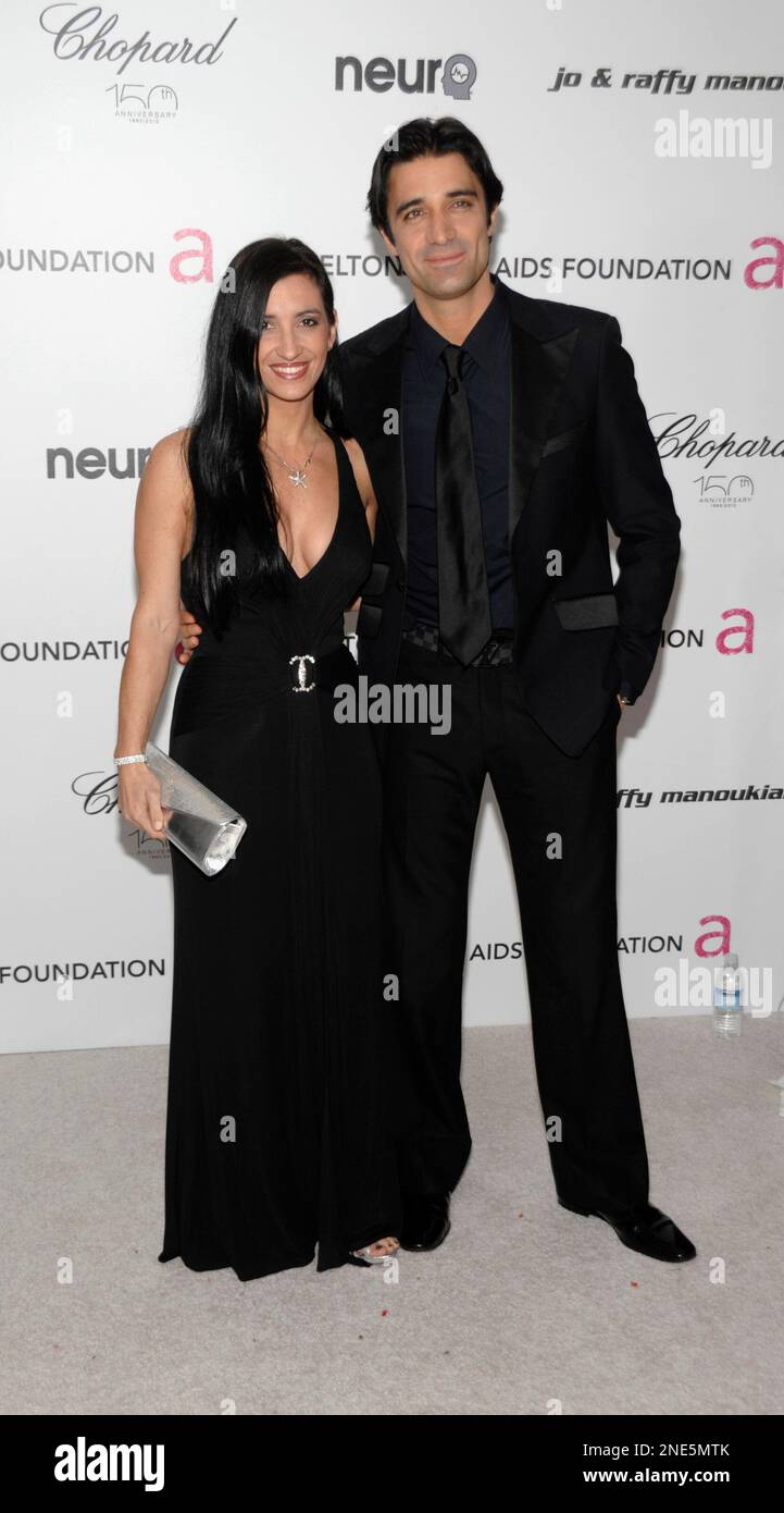 Actor Gilles Marini, right, and wife Carole Marini arrive at the Elton ...
