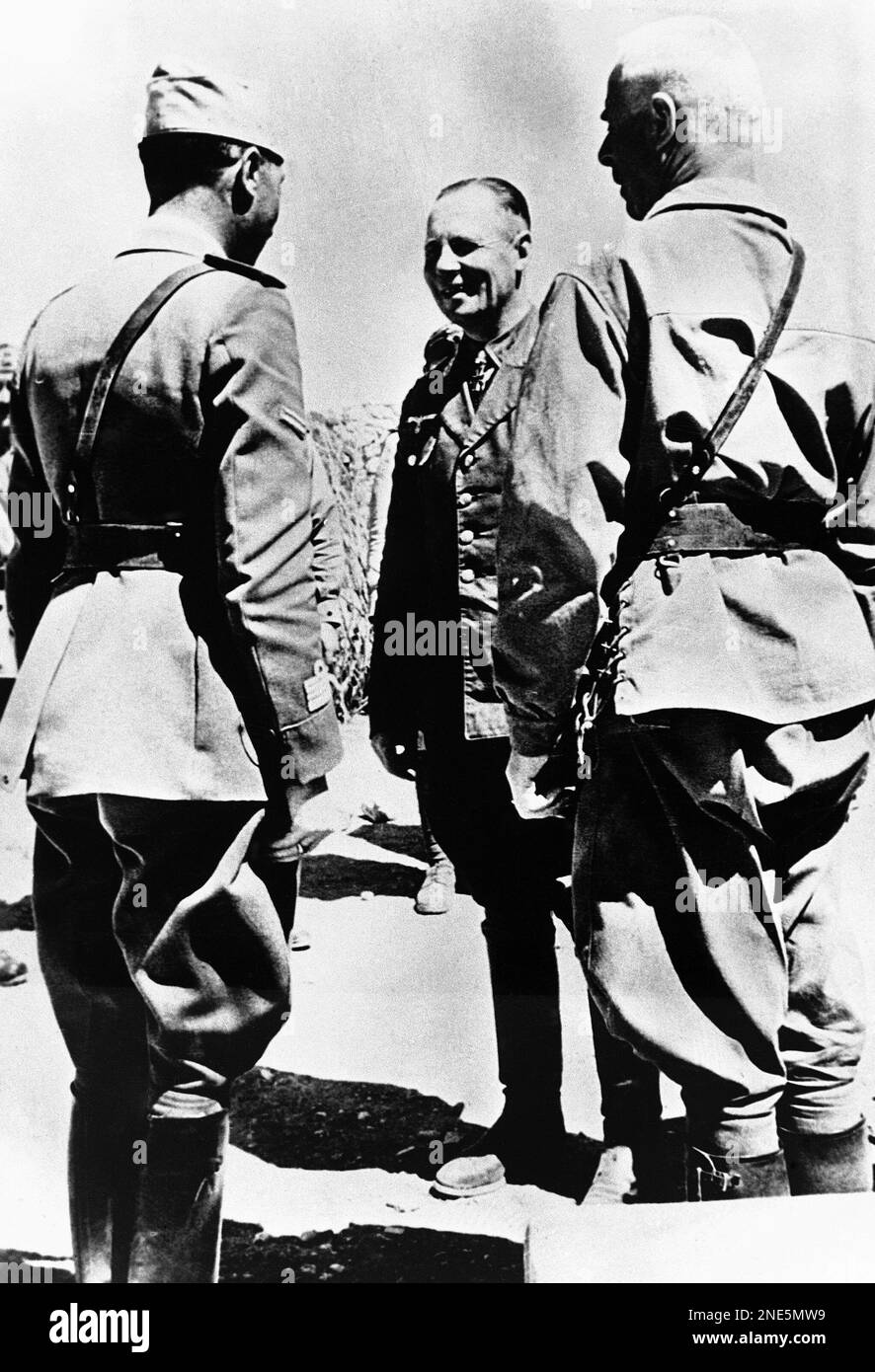 German General Erwin Rommel, centre, the commander of the German forces ...