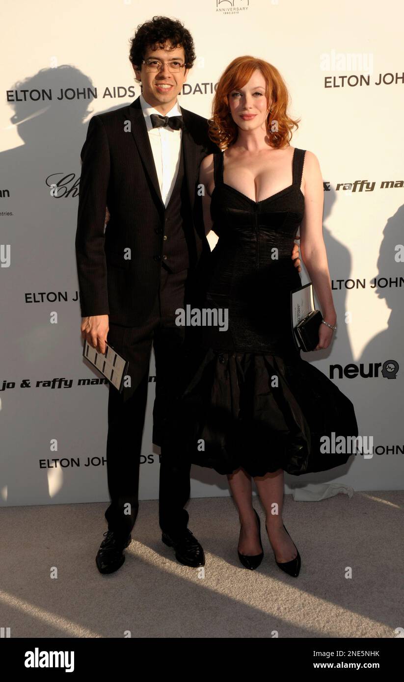 Actress Christina Hendricks, right, and Geoffrey Arend arrive at the ...