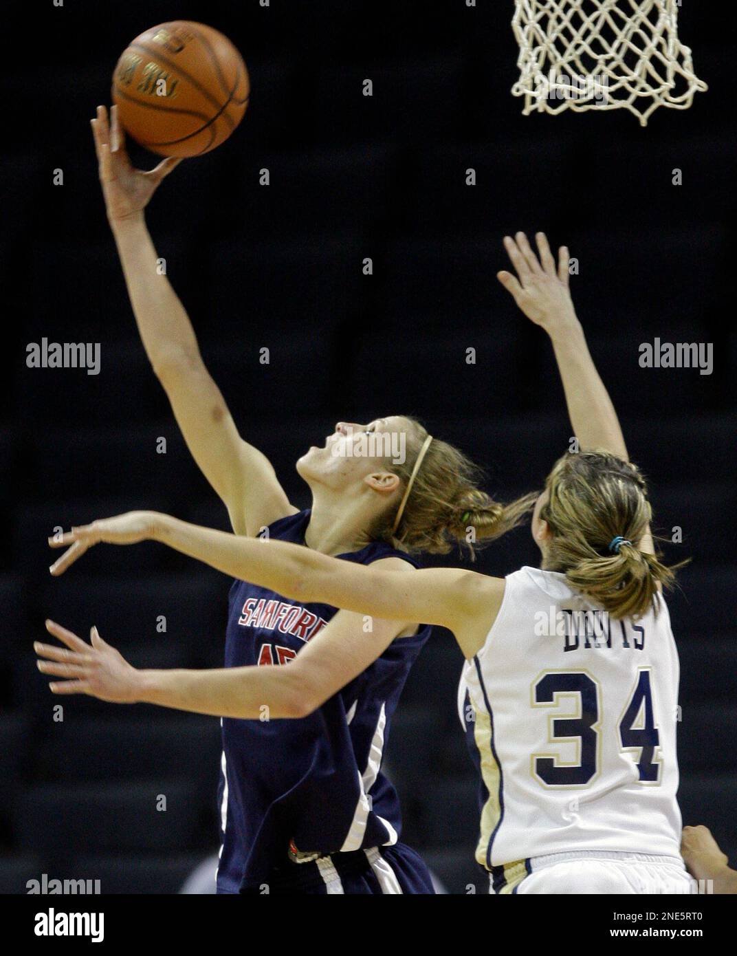 Samford's Savannah Hill (45) shoots over Chattanooga's Michelle Davis ...