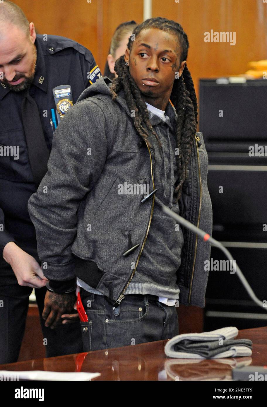 Rapper Lil Wayne is handcuffed at Manhattan criminal court, Monday ...