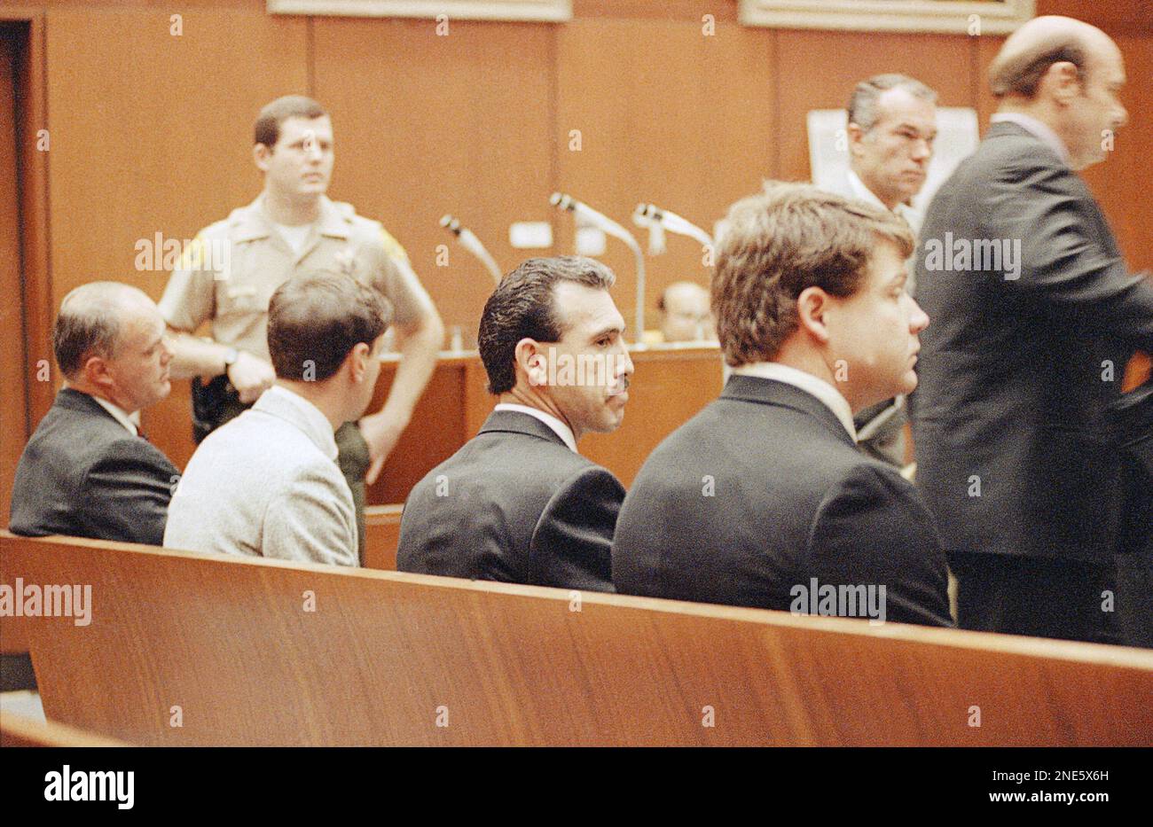 Four Los Angeles police officers await arraignment in a Los Angeles ...