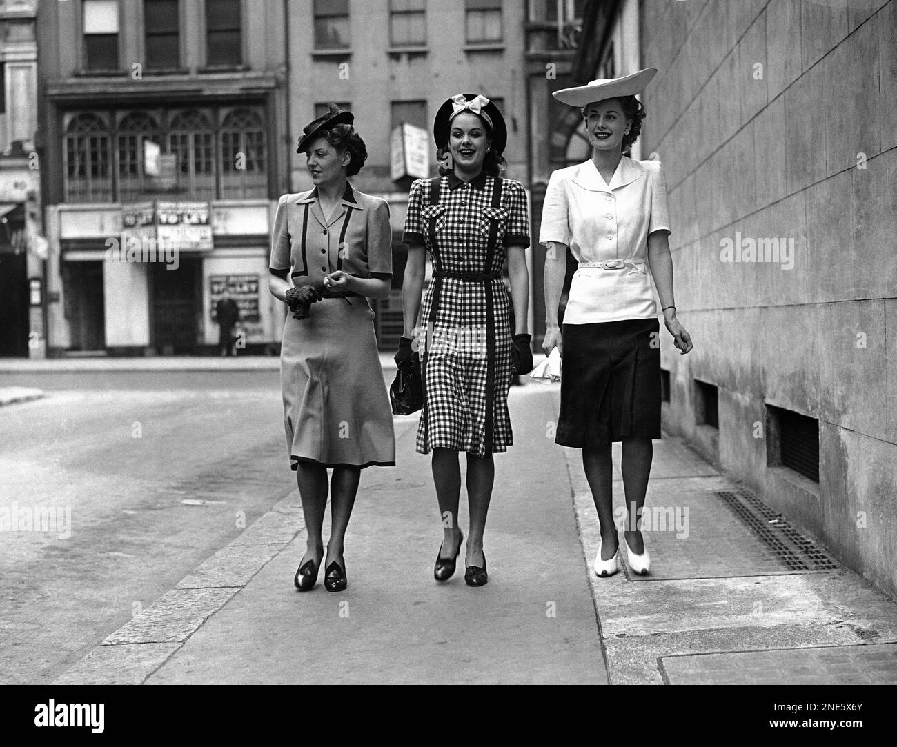 The first collection of utility dresses for women, designed by Norman ...