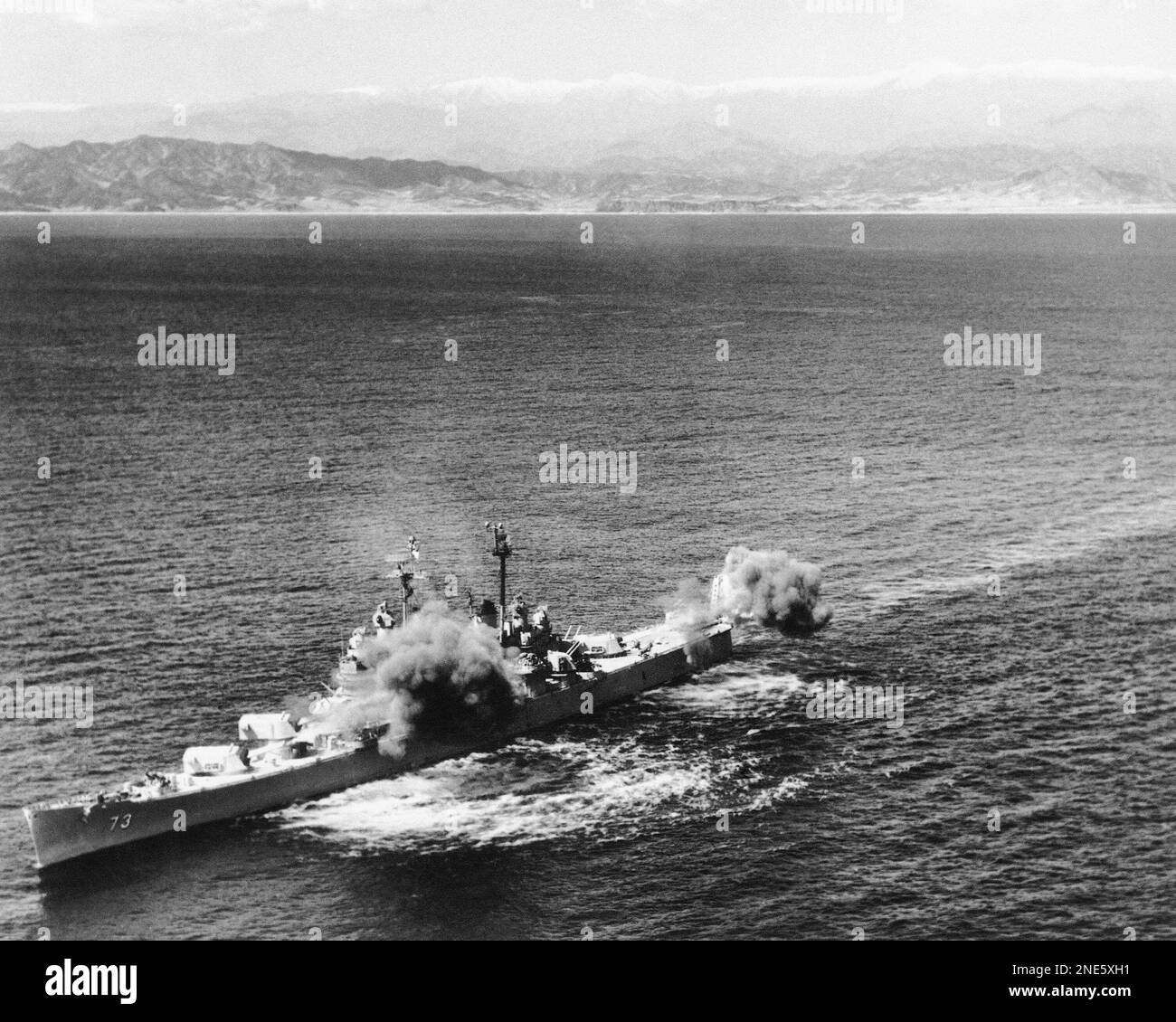 One last Salvo USS Saint Paul fires one last nine gun salvo from her ...