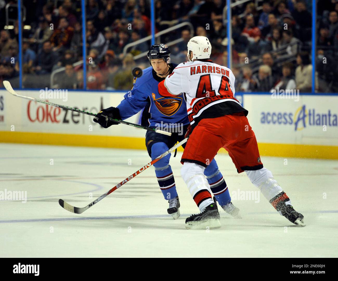 Carolina Hurricanes defenseman Jay Harrison (44) checks Atlanta ...