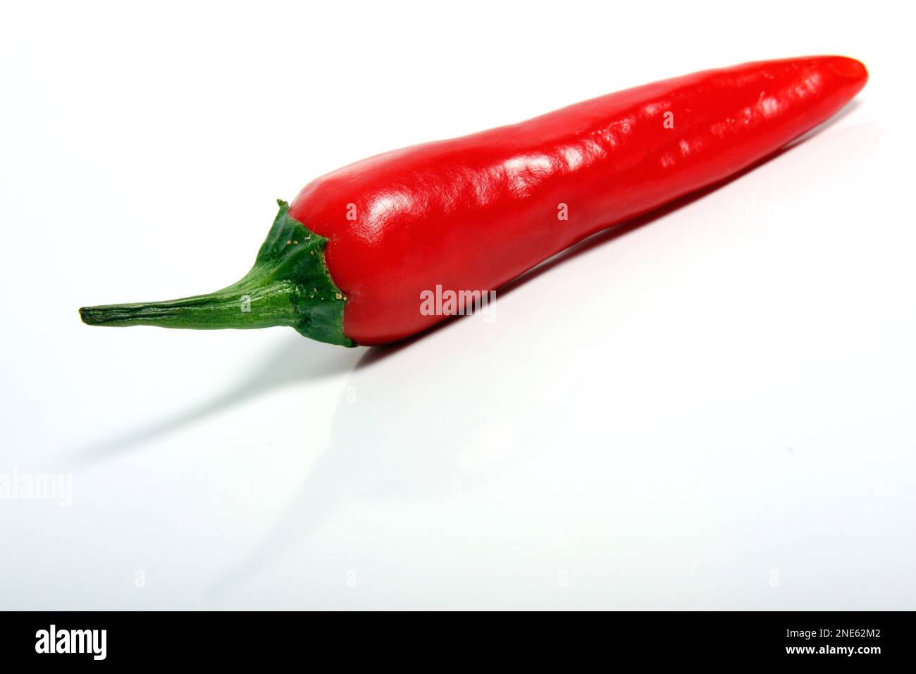 single fresh red pepper Stock Photo - Alamy