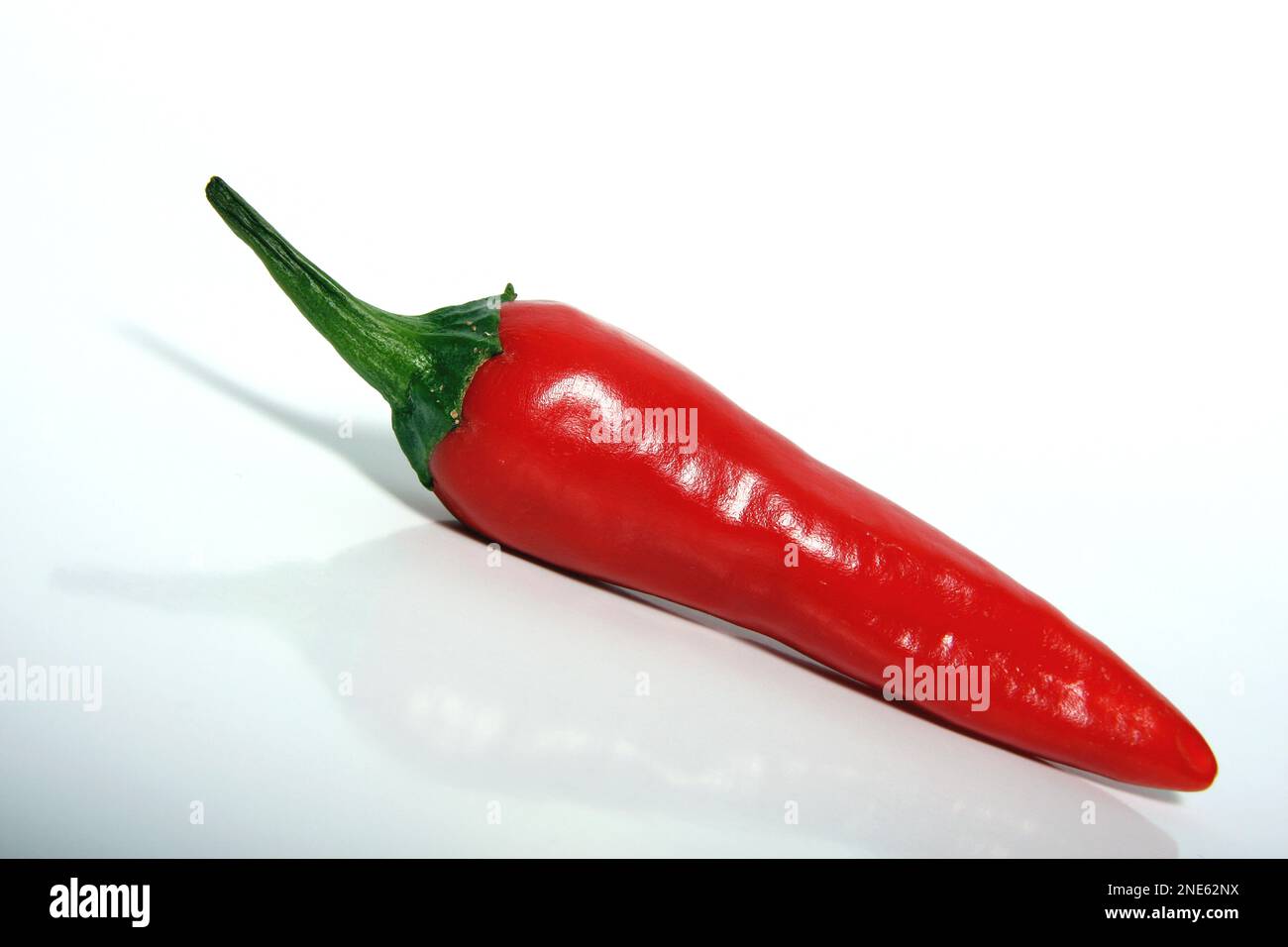 single fresh red pepper Stock Photo - Alamy