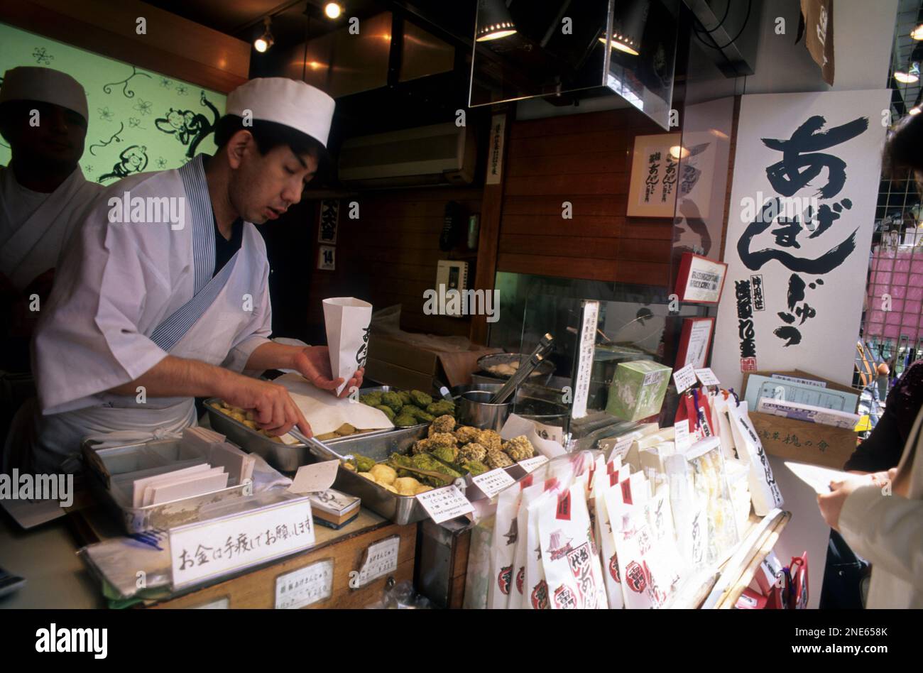 Japan, Tokyo, Asakusa, food vendor at Senso-ji Temple complex Stock ...