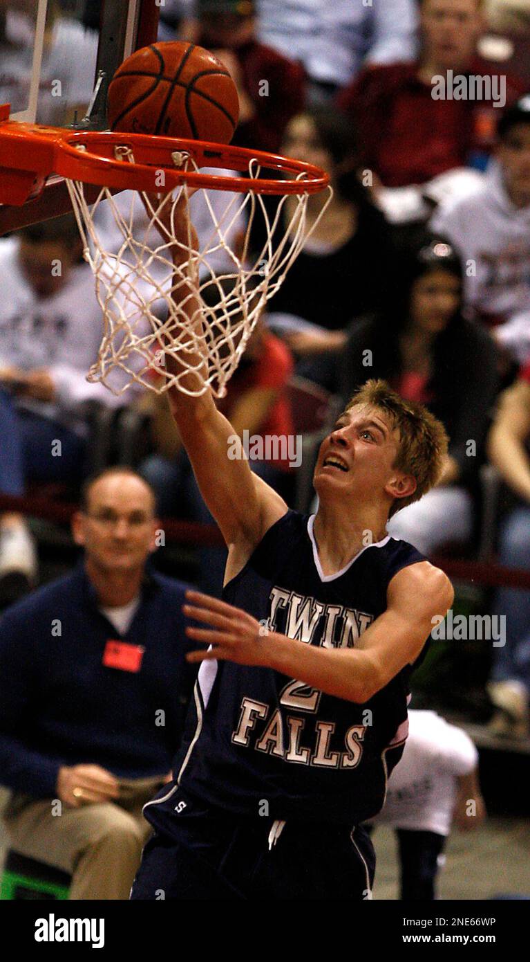 Twin Falls' Brennon Lancaster (2) makes a shot against Moscow in the 4A ...