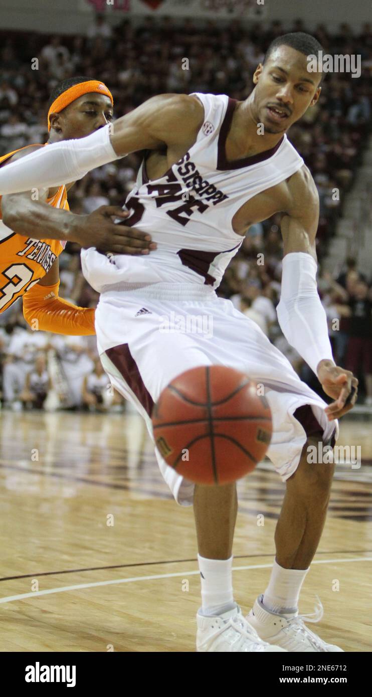 Mississippi State guard Barry Stewart (22) is fouled by Tennessee guard ...