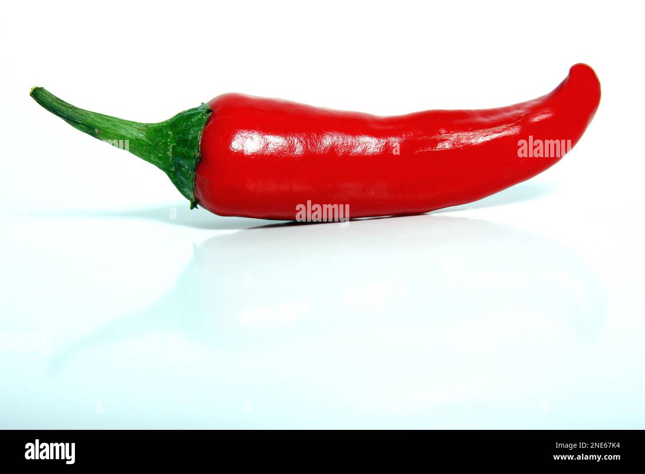 single fresh red pepper Stock Photo - Alamy