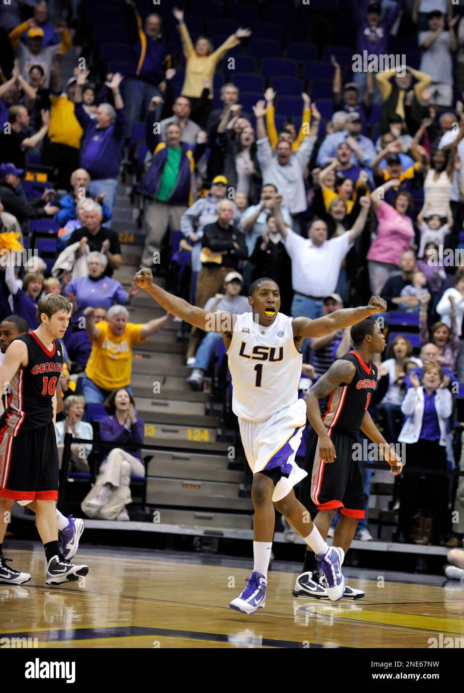 The crowd and LSU forward Tasmin Mitchell (1) reacts to the win as ...