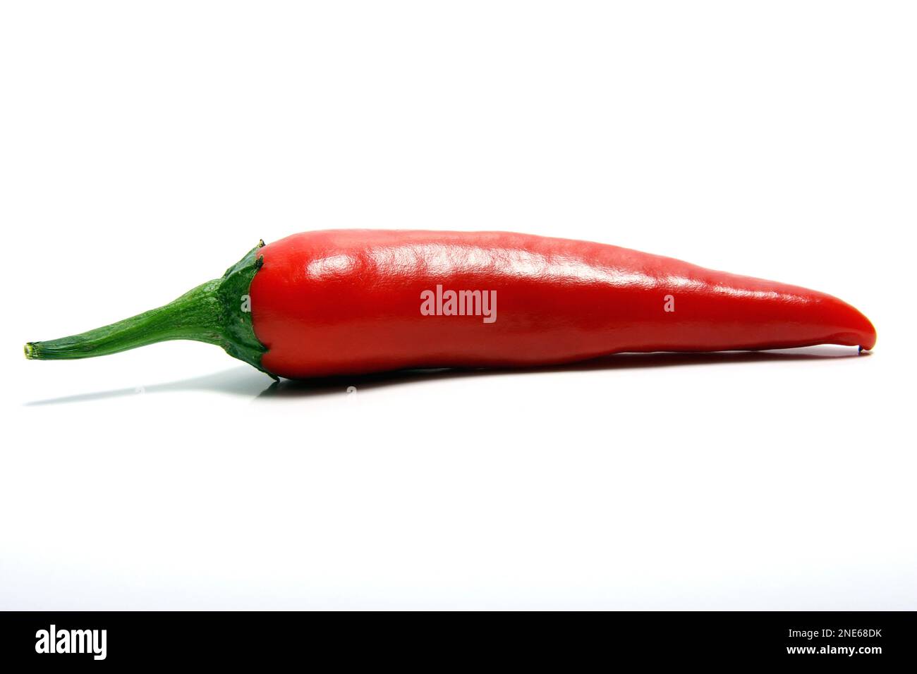 single fresh red pepper Stock Photo - Alamy