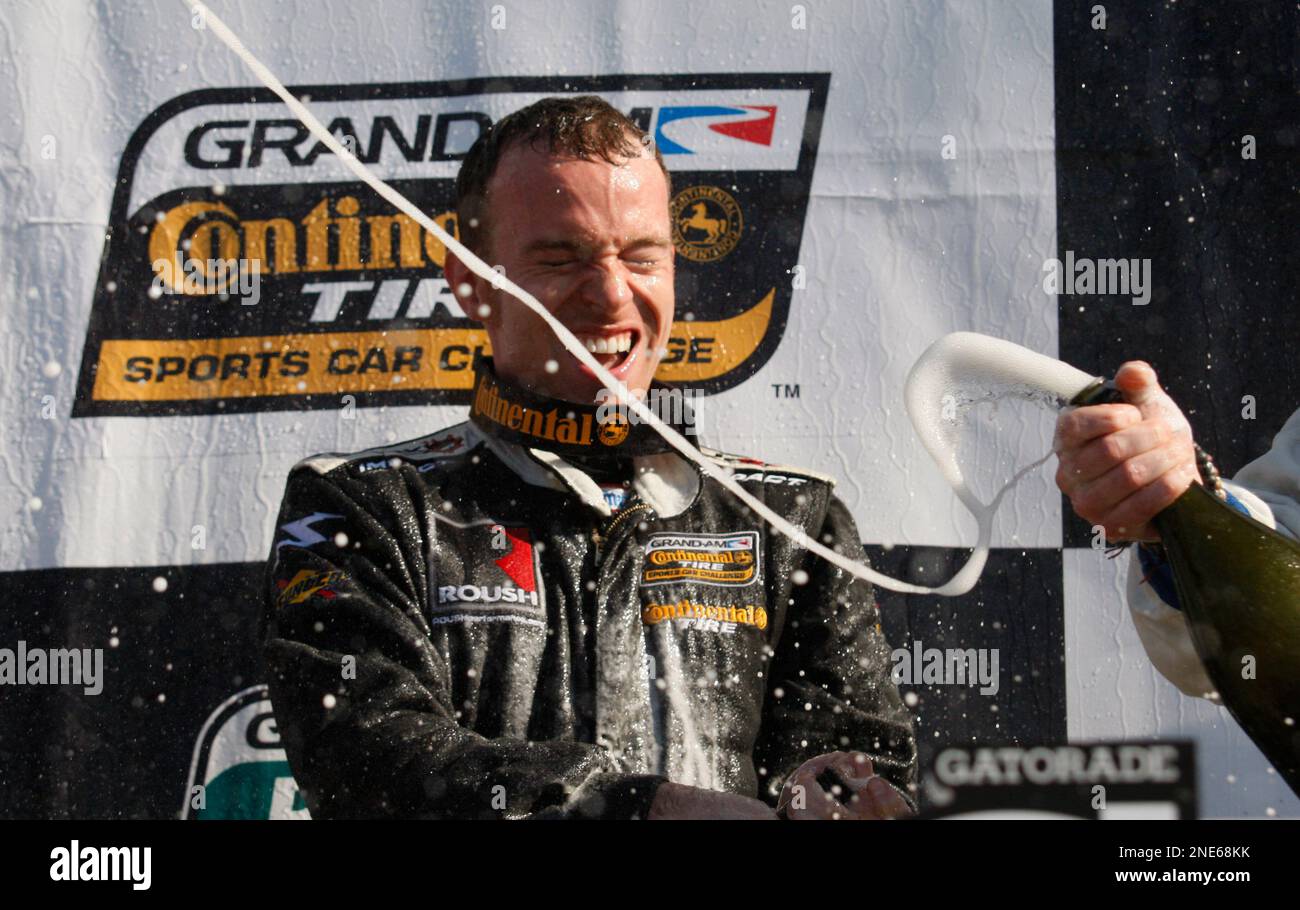 Driver Jack Roush Jr. celebrates Saturday, March 6, 2010, after winning ...