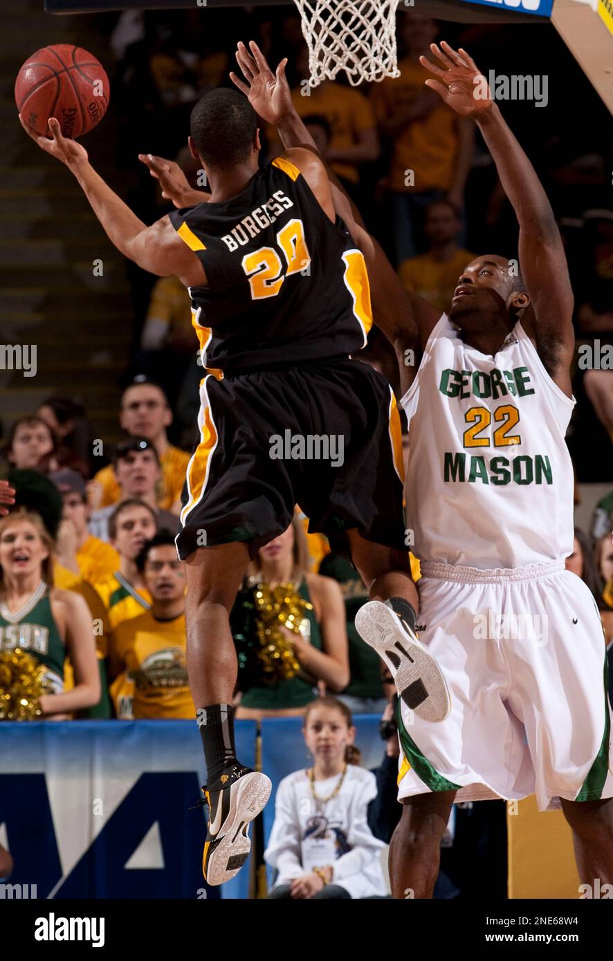 Virginia Commonwealth's Bradford Burgess, left, shoots against George ...