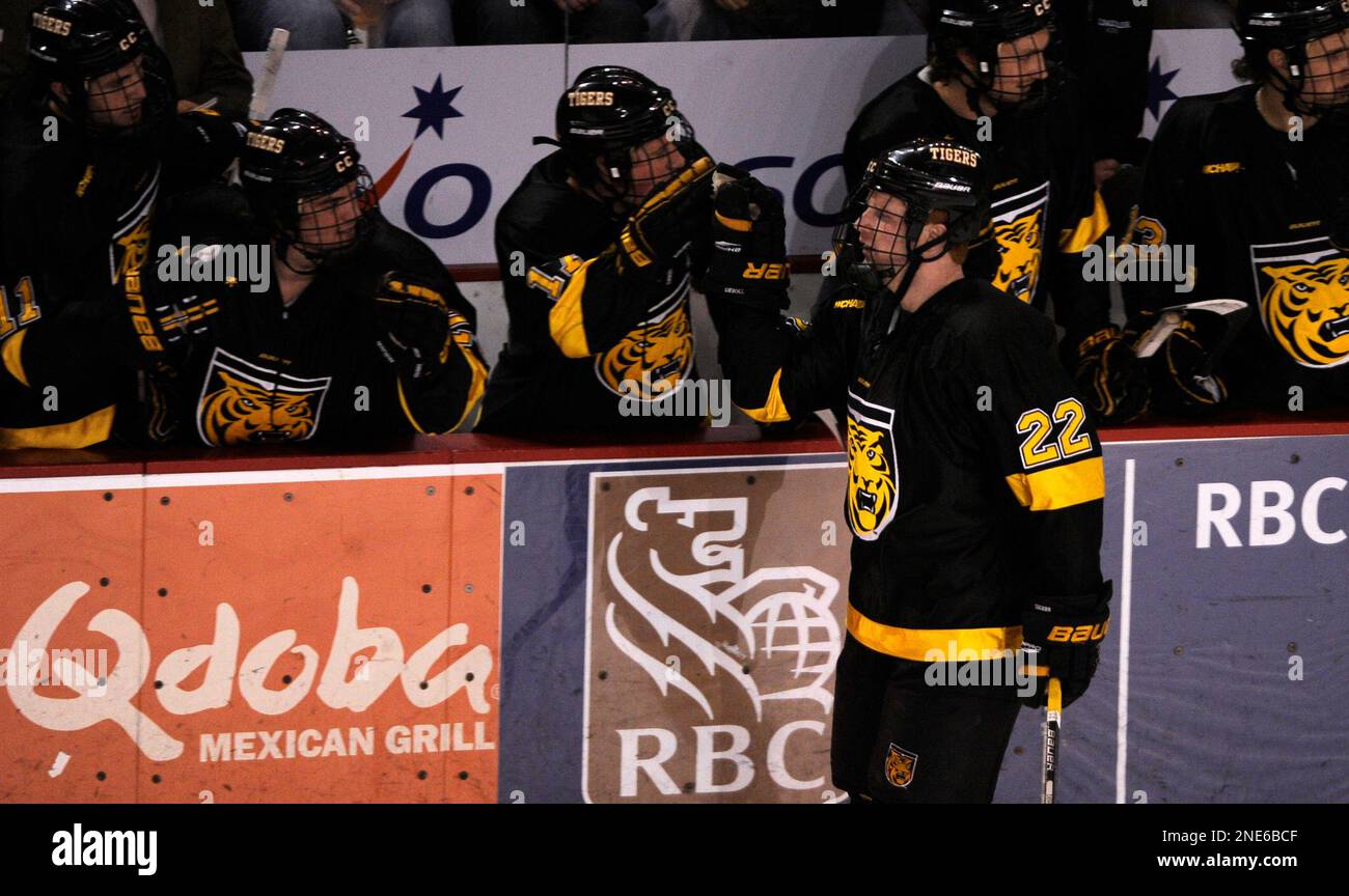 Colorado College center Nick Dineen (22) celebrates his goal against ...