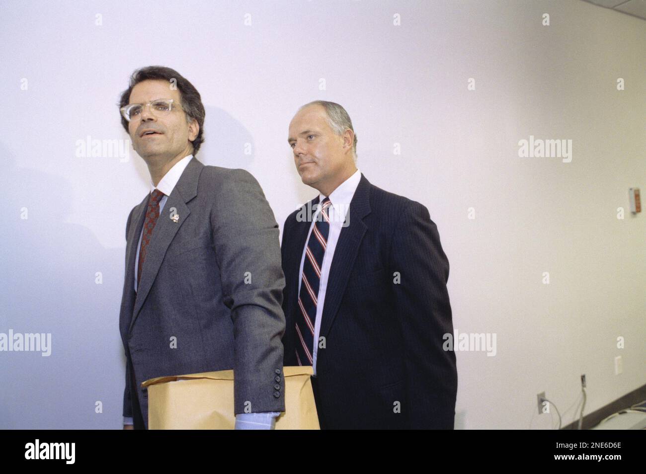 Defense attorney Ira Salzman, left, and his client Los Angeles Police ...