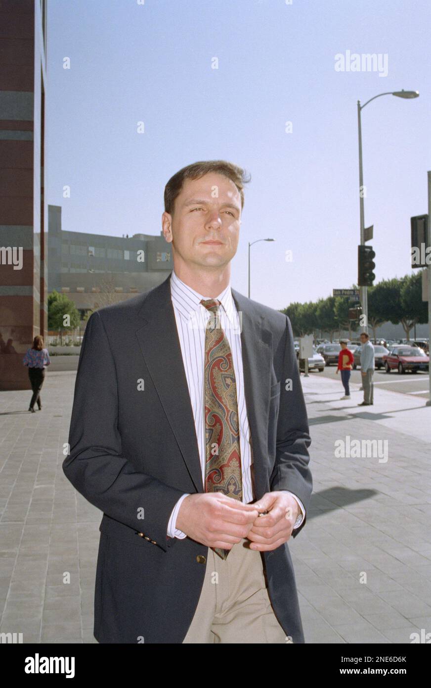 Los Angeles police officer Timothy Wind leaves federal court Tuesday in ...