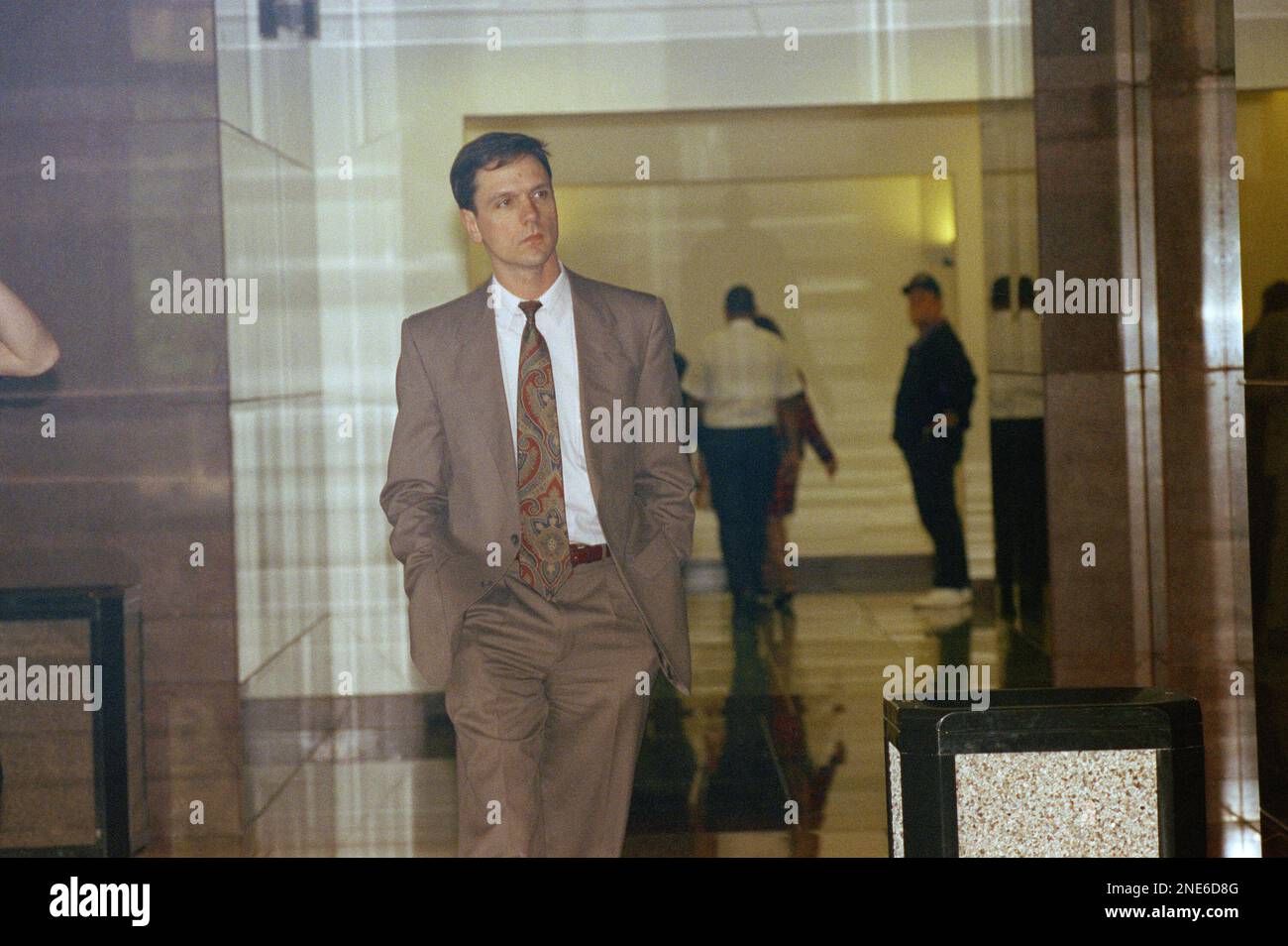 Former Los Angeles Police Officer Timothy Wind walks through the ...