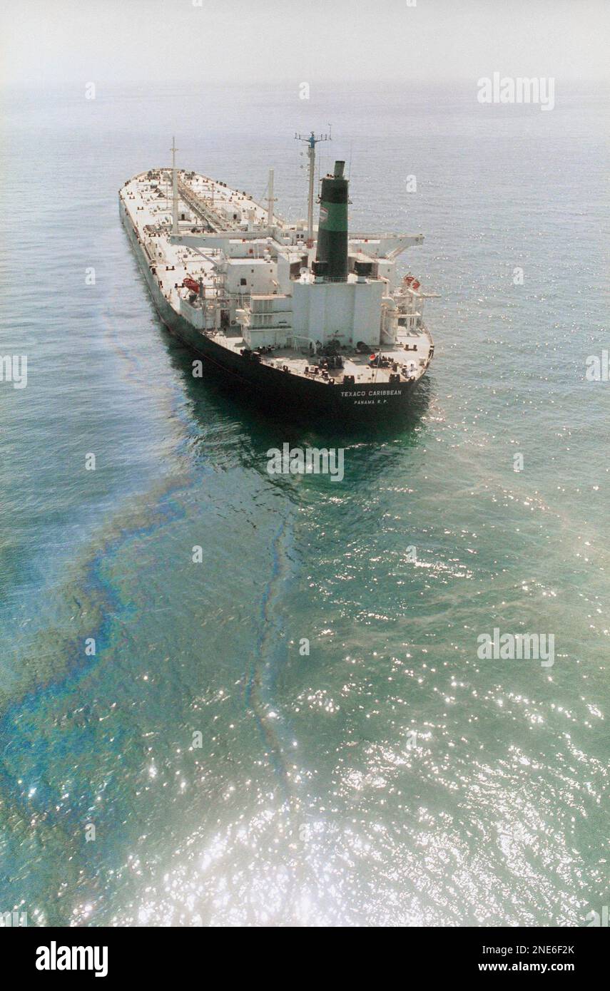 The tanker Texaco Caribbean, spews oil from her hull on Tuesday, August ...