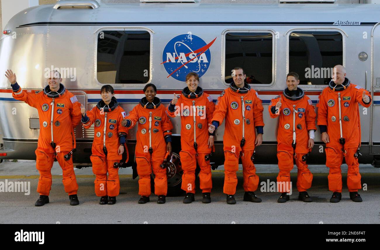 The crew of space shuttle Discovery, from left, mission specialist ...