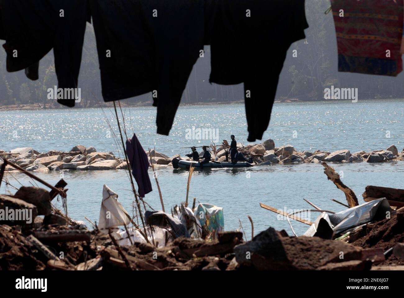 Marines search for victims in Constitucion, Chile, Thursday, March 4 ...