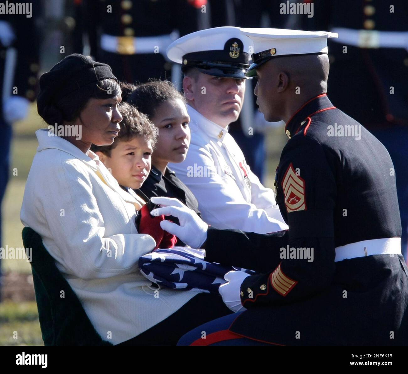 Family members and friends mourn at the funeral of Marine Lance Cpl ...