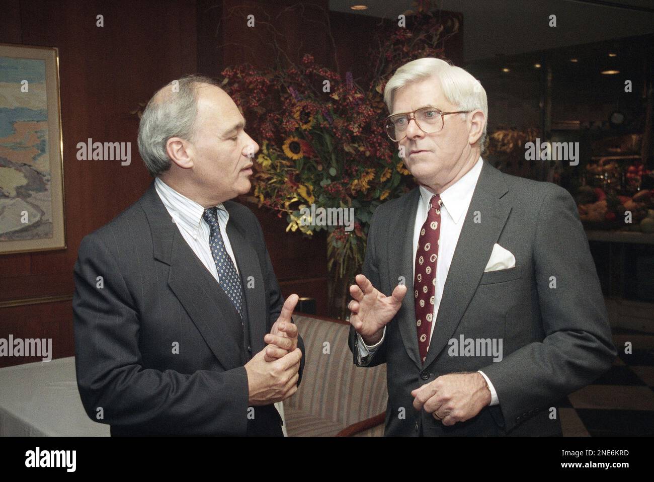Soviet journalist Vladimir Pozner, left, chats with talk show host Phil ...