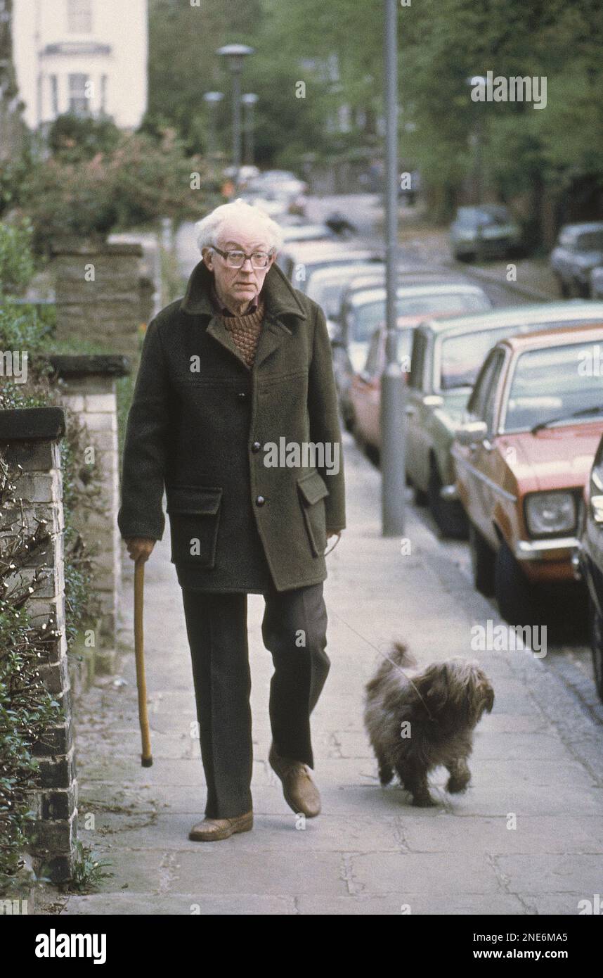 Leader of Britain's Labour Party Michael Foot walks his pet dog ...